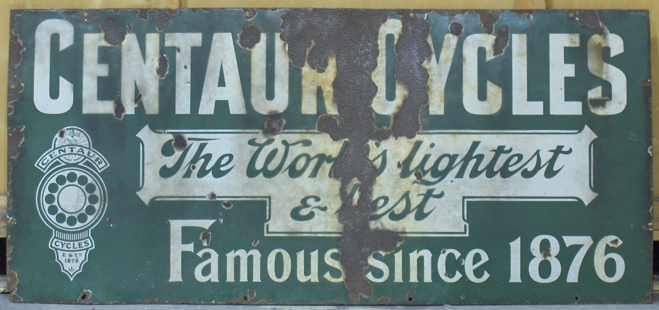Bonhams Cars : A 'Centaur Cycles' enamel sign, c1910,