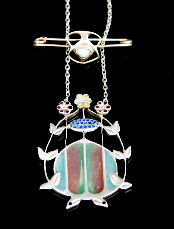 Bonhams : Merle Bennett A 9ct gold and turquiose set bar brooch