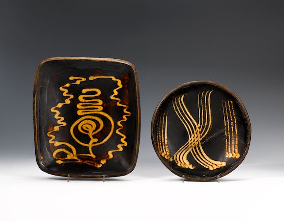 Bonhams : A Staffordshire slipware dish mid 18th century