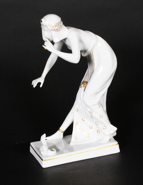 Bonhams : A Rosenthal figure of a snake charmer,