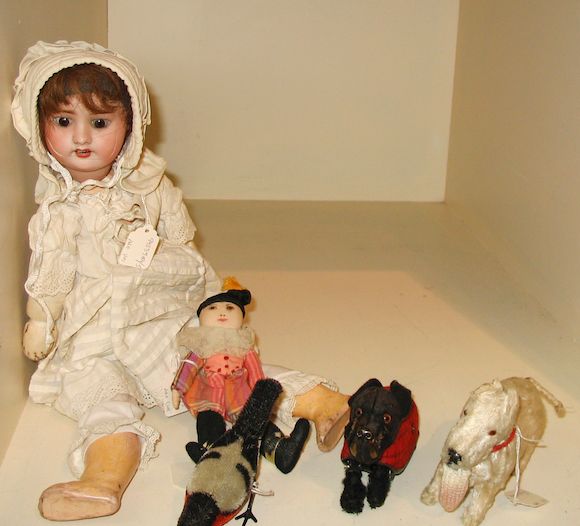 Bonhams : A Schuco clockwork dog and a selection of other clockwork ...