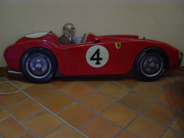Bonhams Cars : A hand-painted wooden Ferrari plaque,
