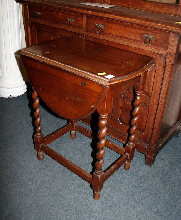 Bonhams : An oak drop-flap table