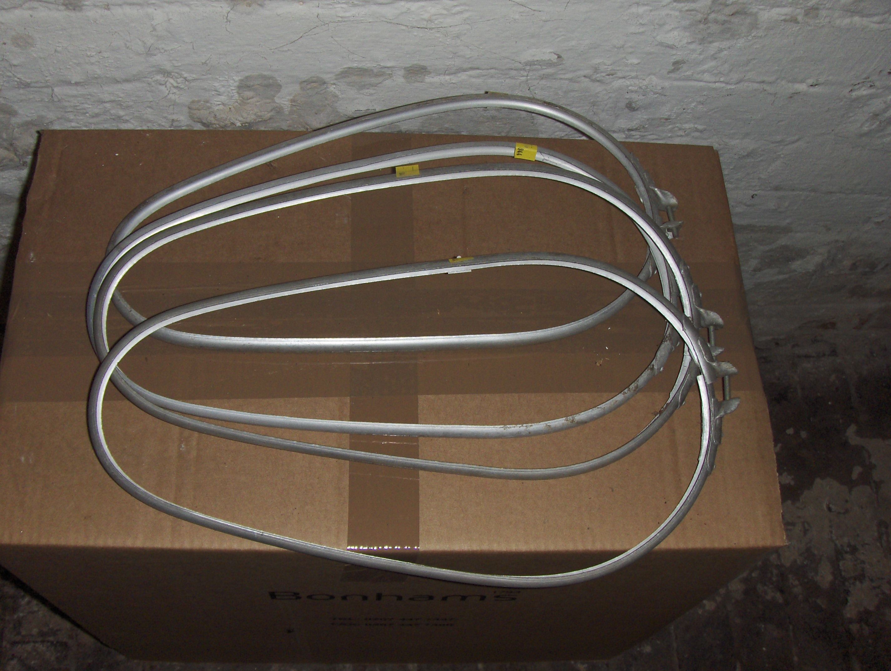 Bonhams Cars : Four believed NOS AMC chain-case bands. (4)