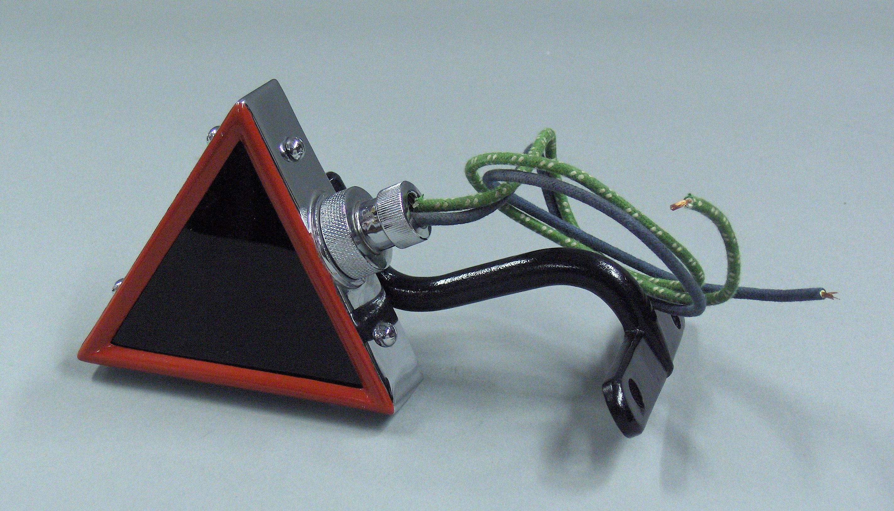 Bonhams Cars : A 'four wheel brakes' triangle rear lamp,