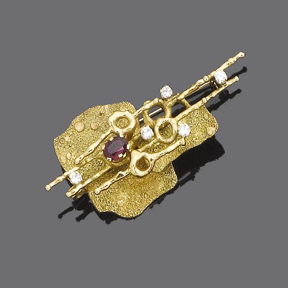 Bonhams : A diamond and synthetic ruby brooch/pendant
