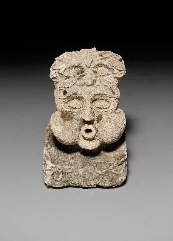 Bonhams : A carved limestone grotesque head