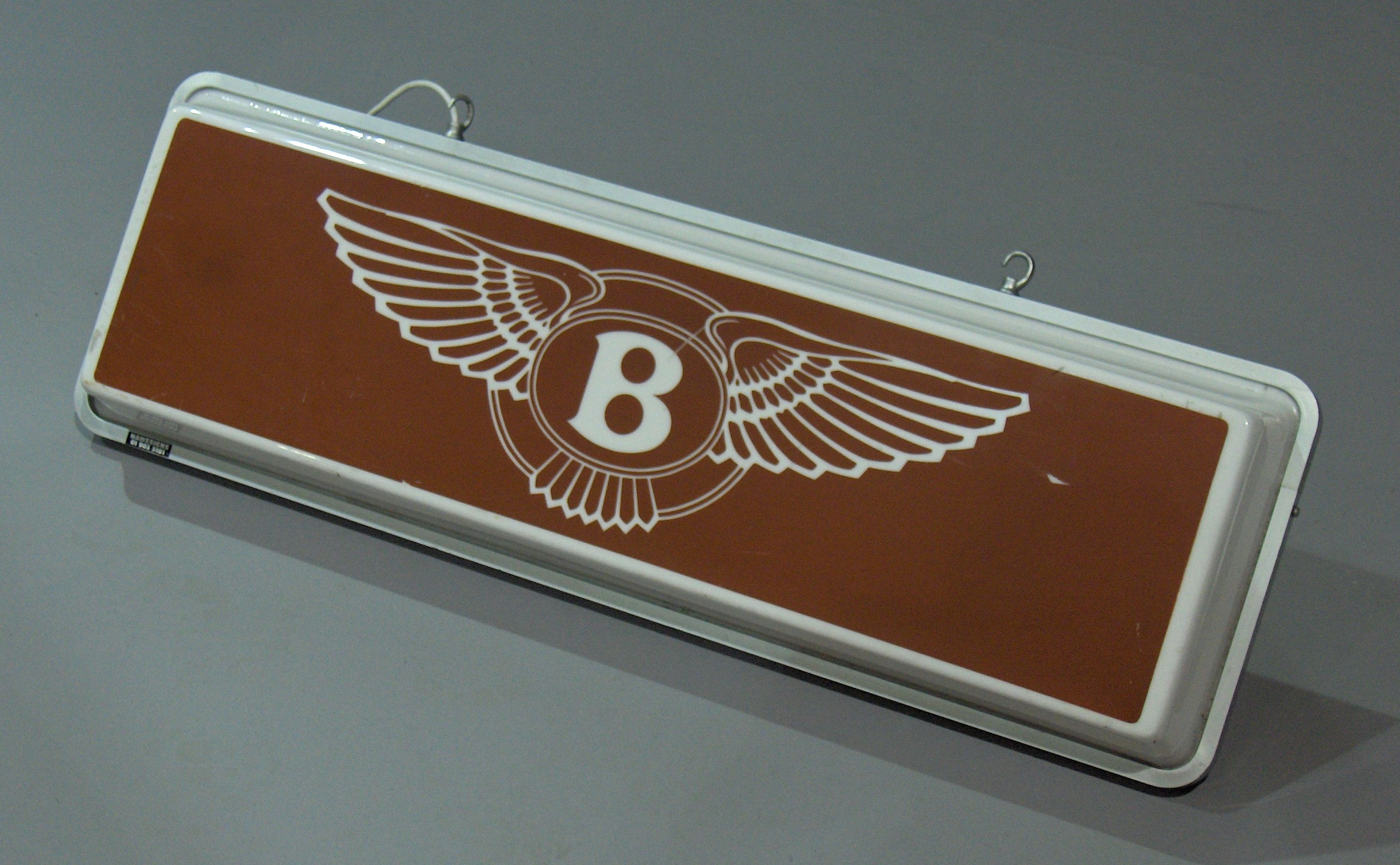 Bonhams Cars : A Bentley hanging illuminated showroom display sign,