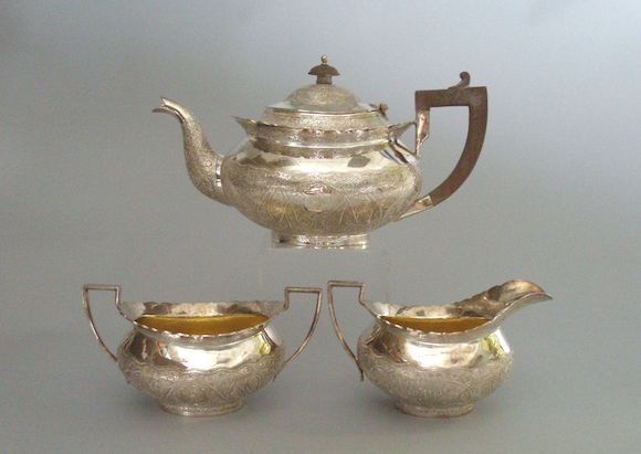 Bonhams : A three piece Indian metalware tea service, unmarked, two ...