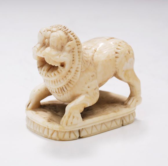 Bonhams : An early carved ivory lion Possibly Ceylonese 16th/17th century