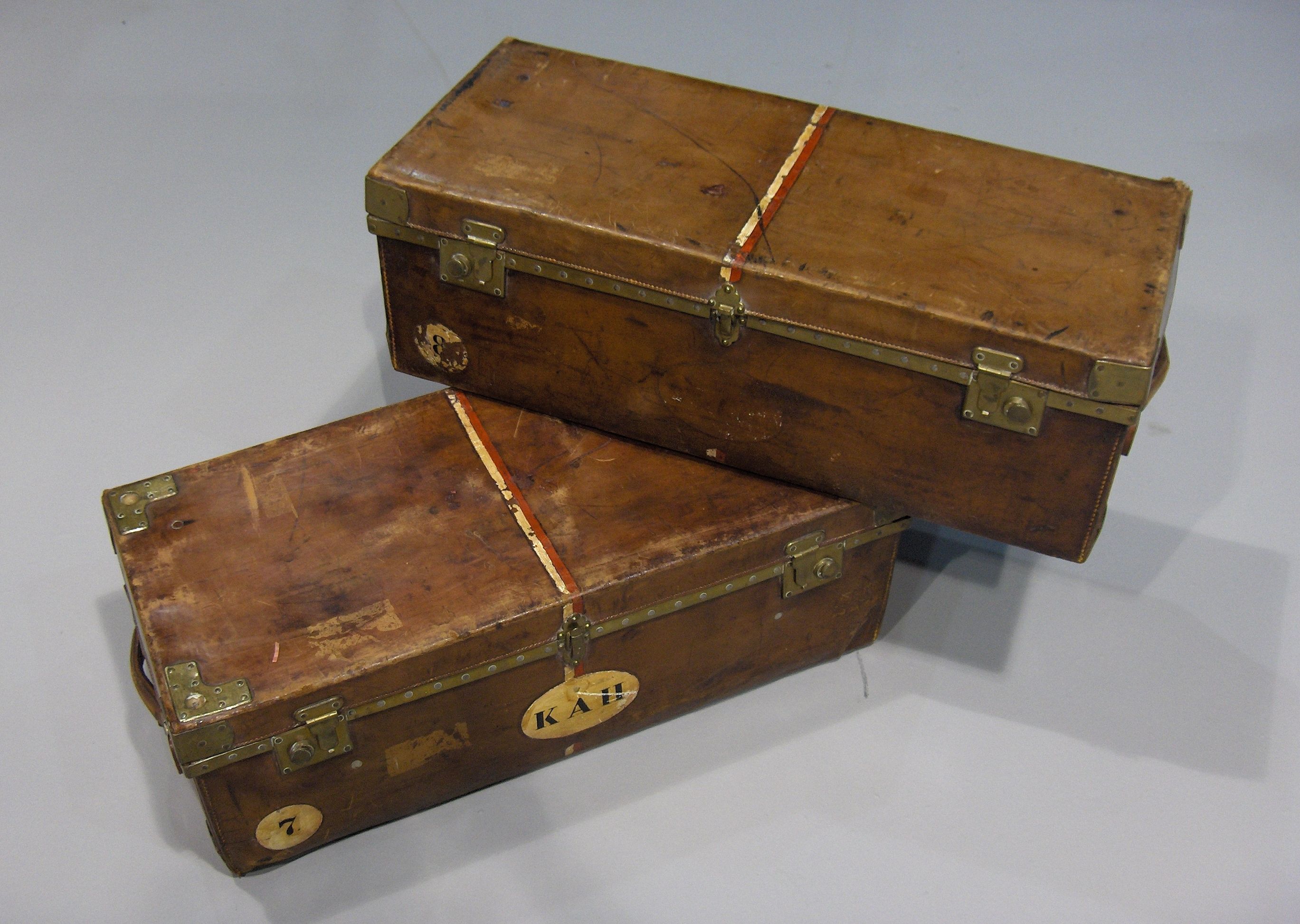 Bonhams Cars : A fine pair of honey leather traveling cases,
