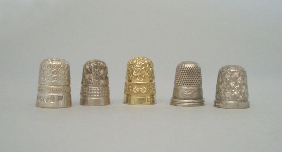 Bonhams : A collection of eleven silver thimbles, a silver gilt thimble ...