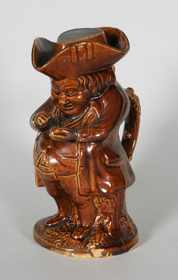 Bonhams : A stoneware Toby jug and cover 'The Snuff Taker' 19th Century