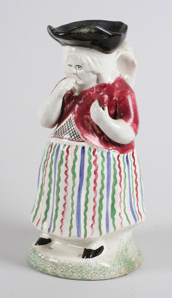 Bonhams : A Portobello type Toby jug 'Female Snuff Taker' 19th Century