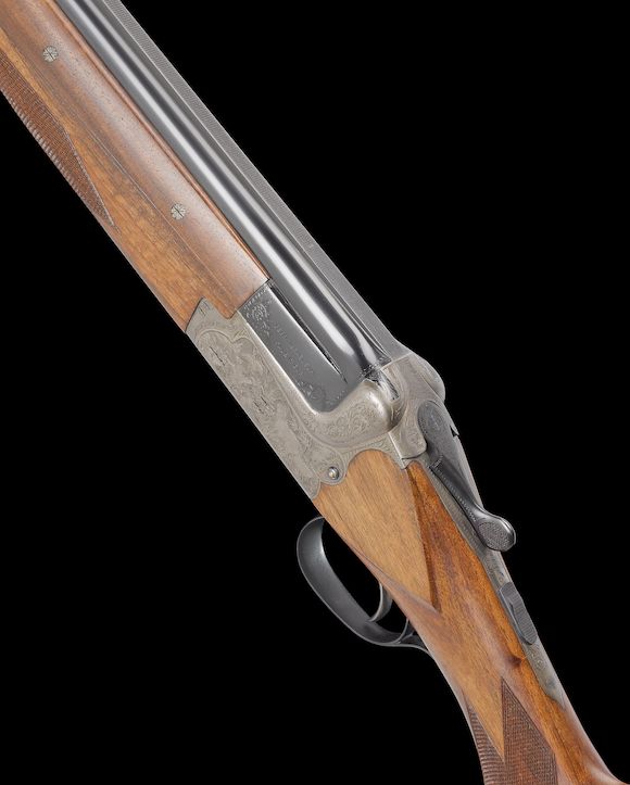 Bonhams : A 12-bore (2¾in) 'Model 201E' single-trigger over-and-under ...