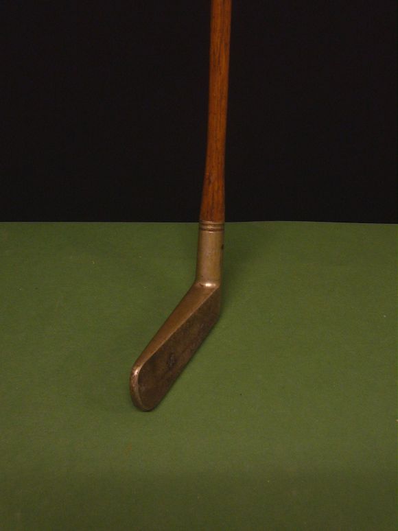 Bonhams : An unusual wedge shaped duplex putter