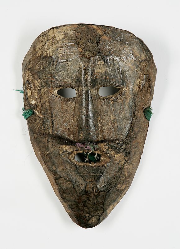Bonhams : A Himalayan tribal, wood Tamang mask;