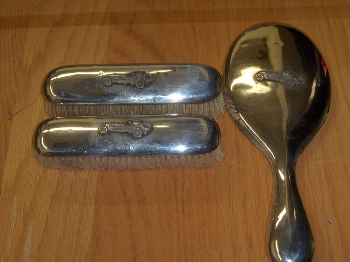 Bonhams Cars : A ladies' silver vanity set,
