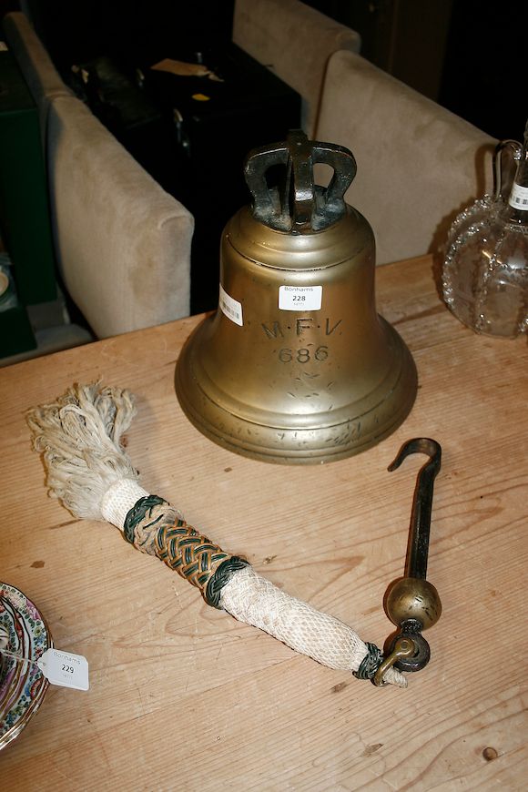 Bonhams : A Naval motorised fishing vessel bell 28cm high.