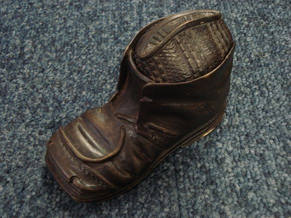 Bonhams : A novelty ebonised treen snuff mull in the form of an old ...