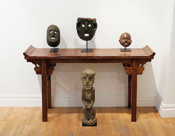 Bonhams : A mottled brown wood 'altar table',