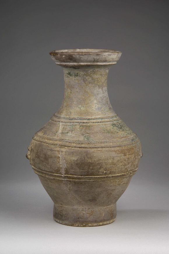 Bonhams : A green glazed pottery hu vase