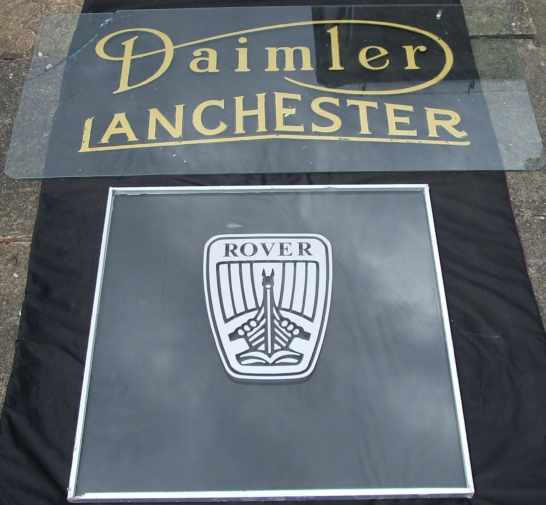 Bonhams Cars : A Daimler and Lanchester glass sign,