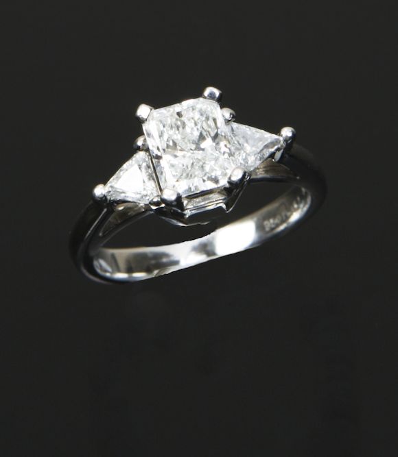 Bonhams : A radiant-cut diamond ring with triangular-cut diamond shoulders