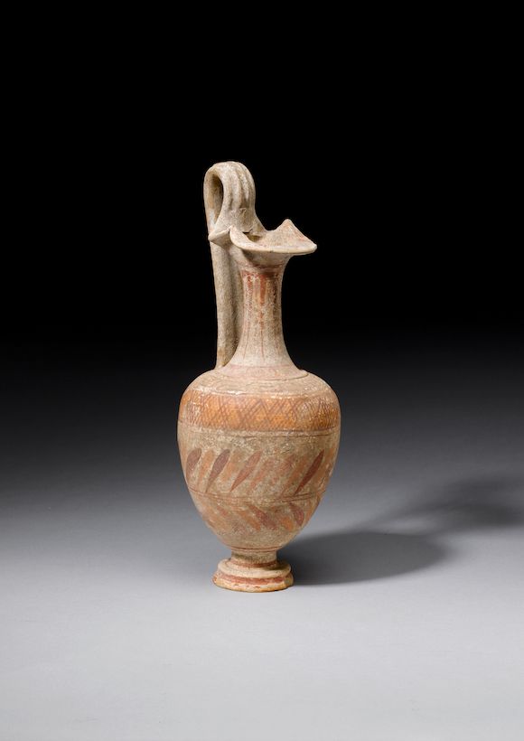 Bonhams : A Canosan pottery oinochoe
