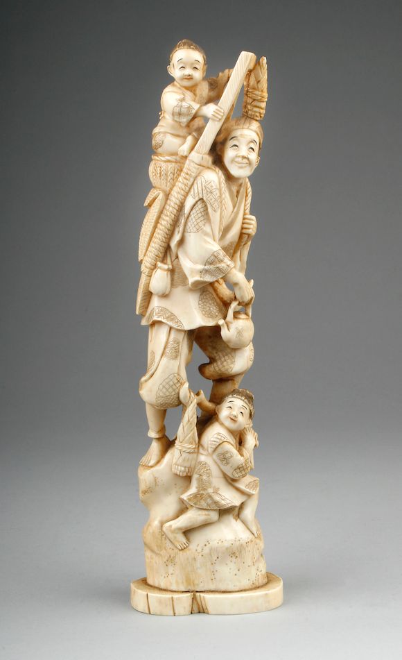 Bonhams : A Japanese carved ivory family group