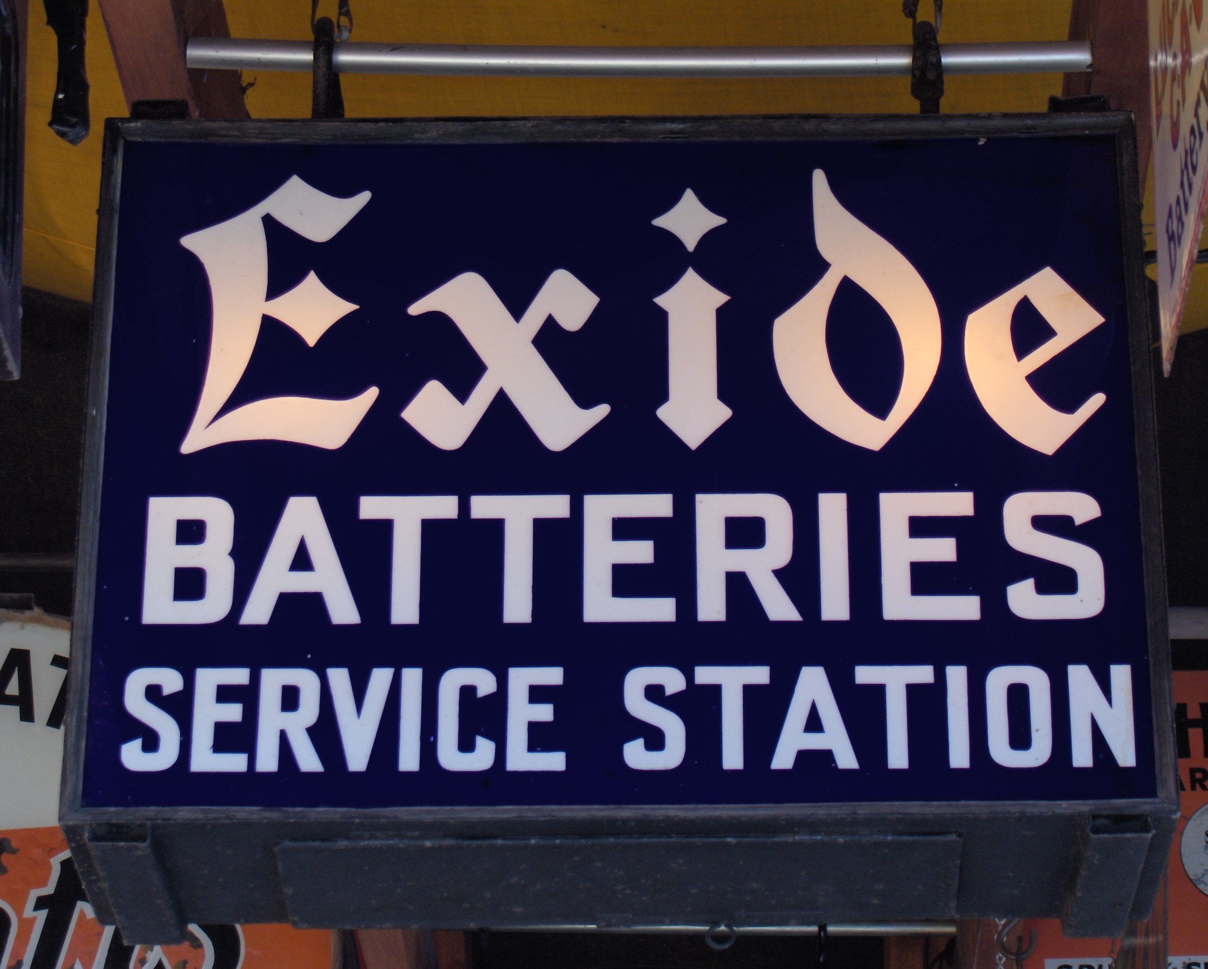 Bonhams Cars : An 'Exide Batteries Service Station' illuminated sign,