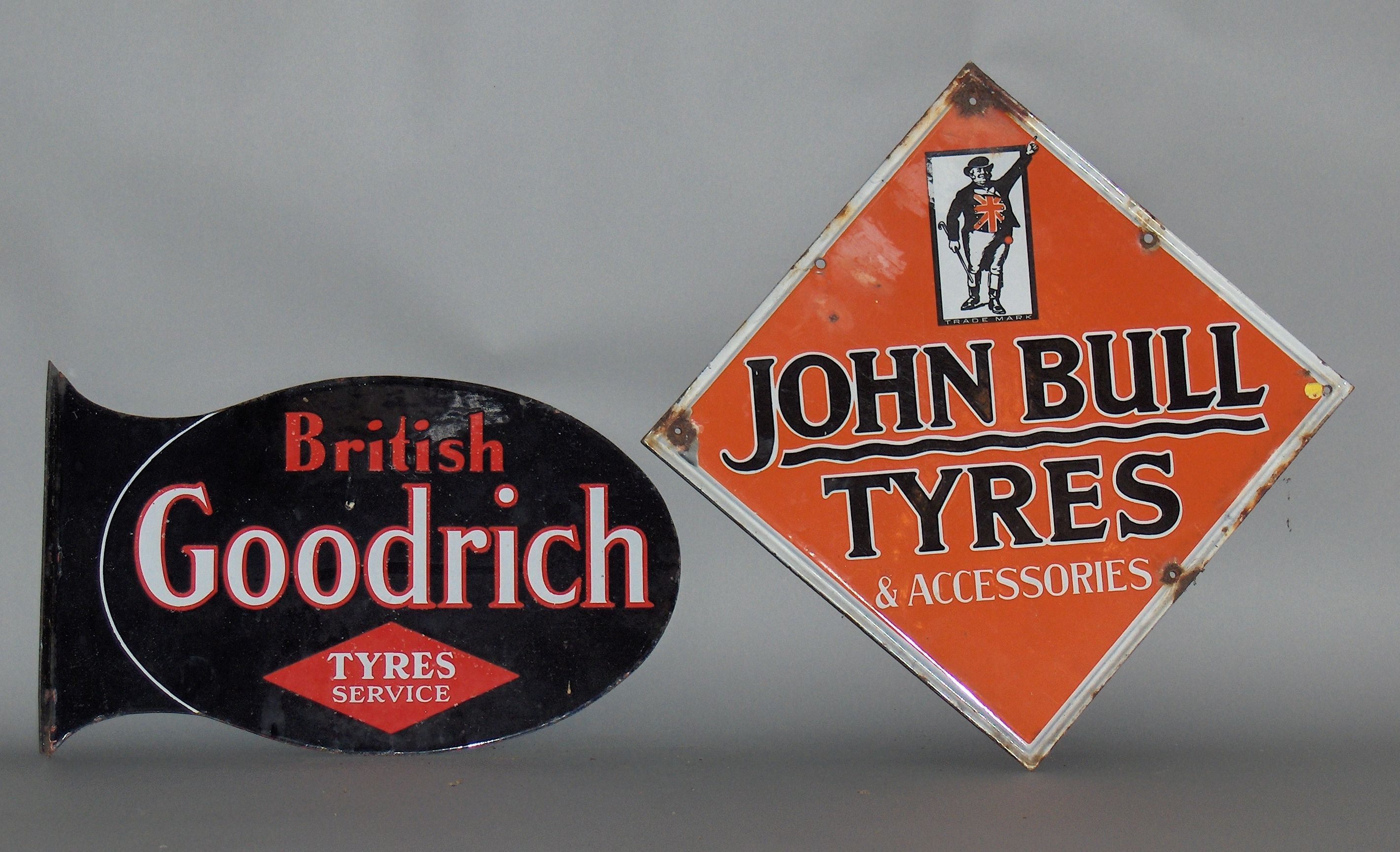 Bonhams Cars : Two enamel tyre advertising signs,