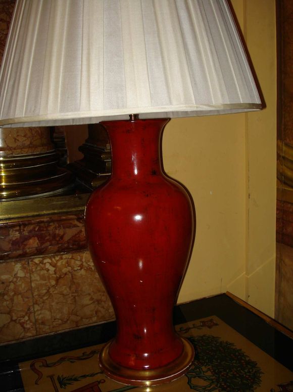 Bonhams : A set of four large red glazed ceramic table lamp bases