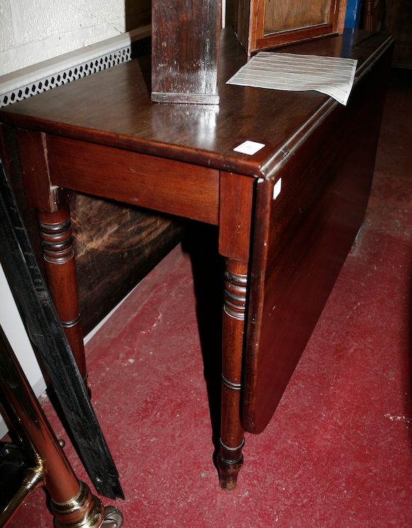 Bonhams : A 19th century mahogany drop flap dining table