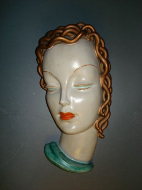 Bonhams : Goldscheider A Terracotta Wall Mask, circa 1935