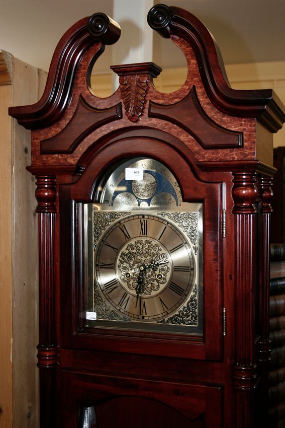 Bonhams : A reproduction longcase clock,