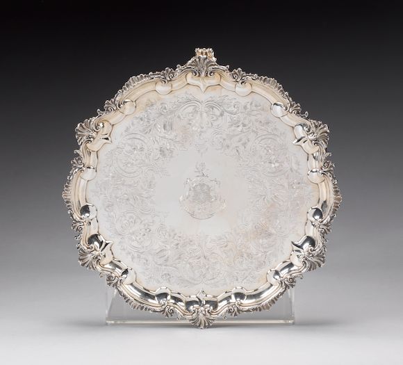 Bonhams : A silver shaped circular salver, underneath of border with ...