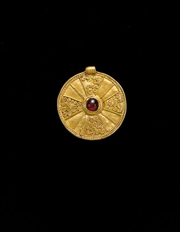 Bonhams : An Anglo-Saxon gold and garnet pendant