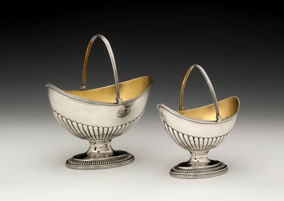 Bonhams : A graduated pair of George III silver swing-handled sugar ...