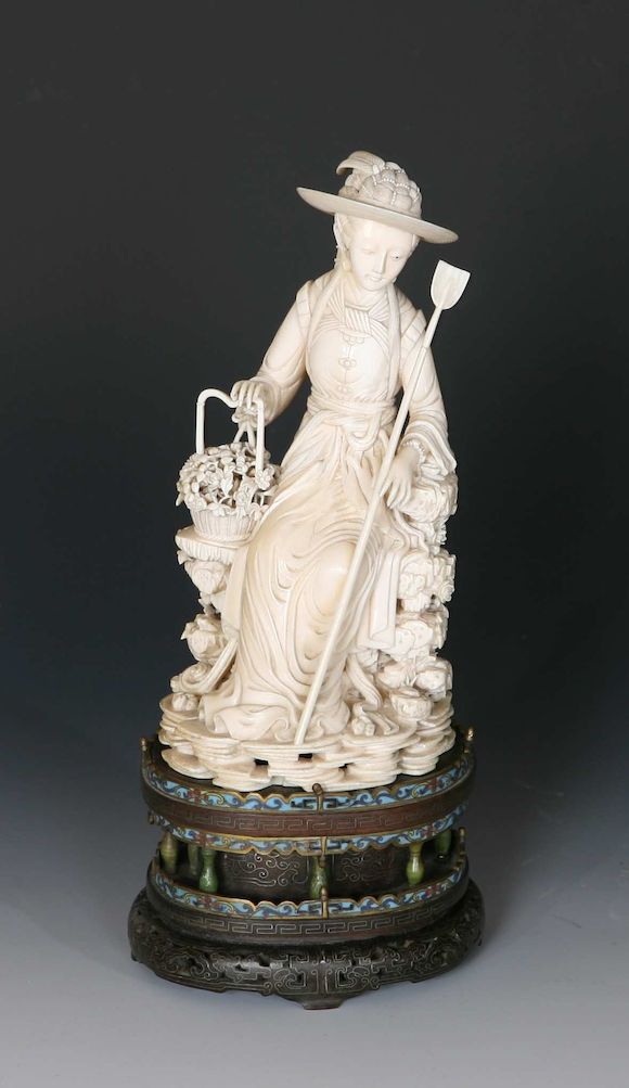 Bonhams : A 19th century Chinese carved ivory figure of a lady gardener