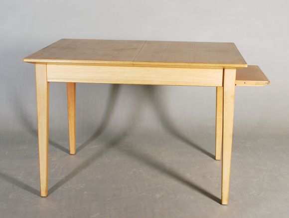 Bonhams : A Gordon Russell rectangular mahogany extending dining table