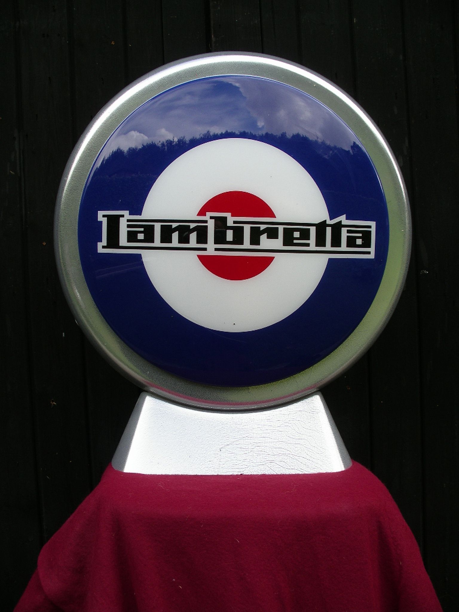 Bonhams Cars : A free standing, illuminated, Lambretta logo,