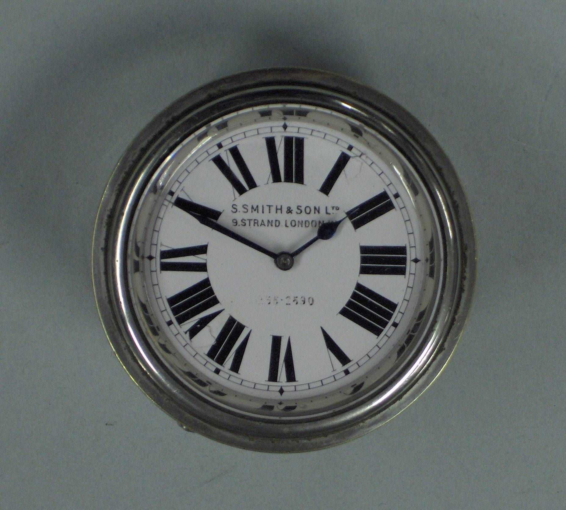 Bonhams Cars : A dashboard-mounting car clock, by Smith & Sons,
