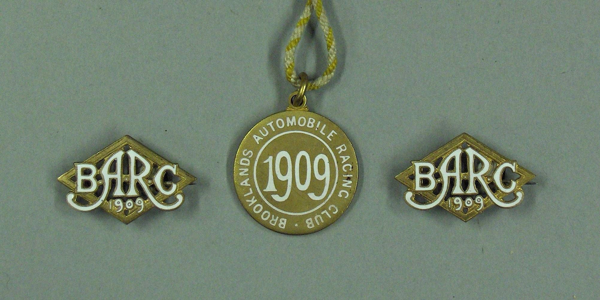 Bonhams Cars : A set of 1909 Brooklands BARC lapel badges,