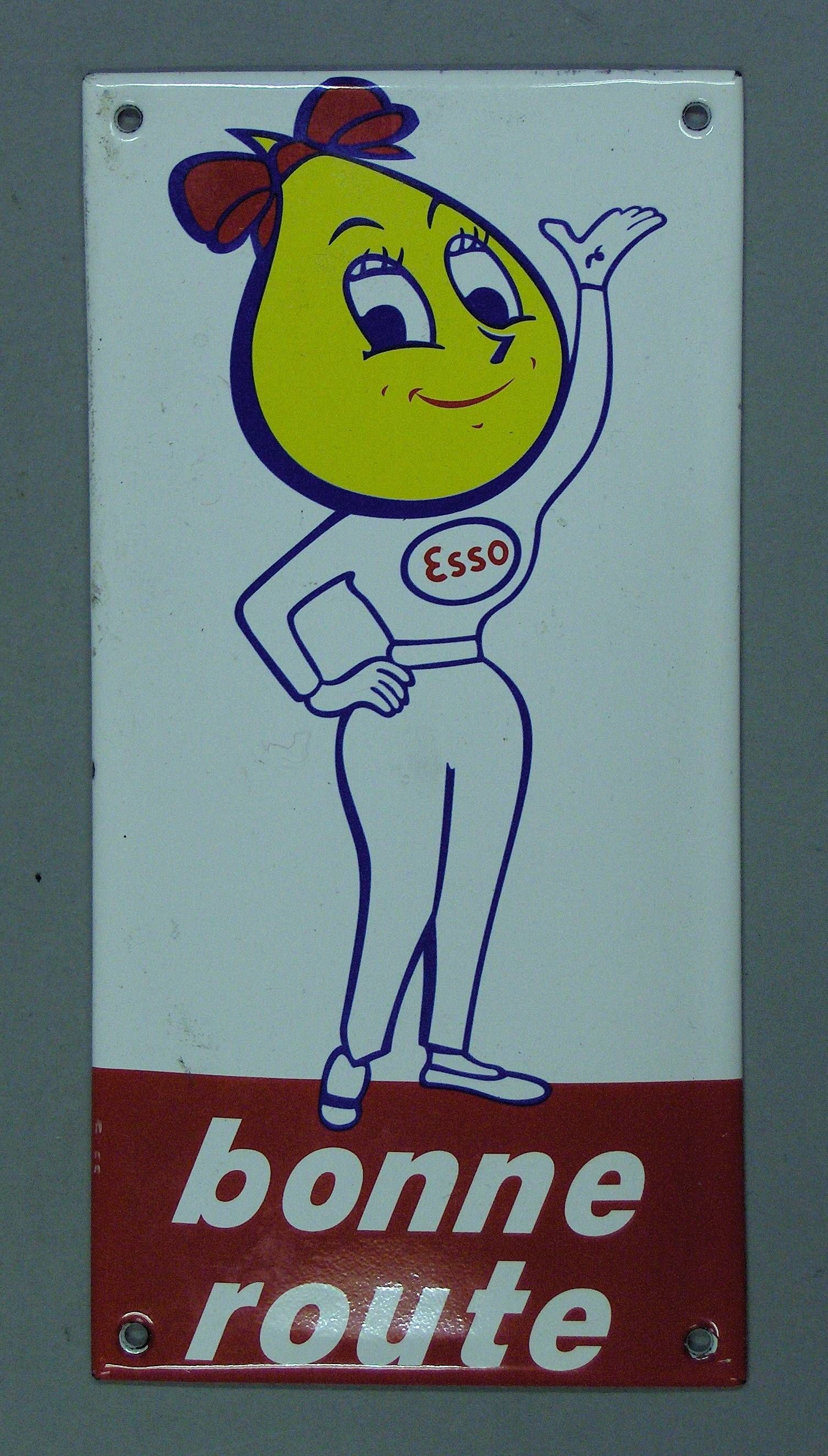 Bonhams Cars : An 'Esso - Miss Drip' enamel exit door plate,