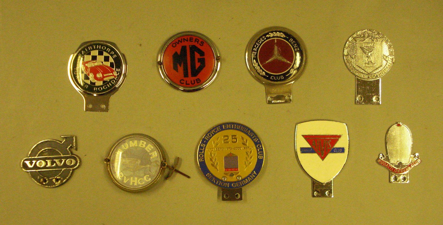 Bonhams Cars : Nine car badges,