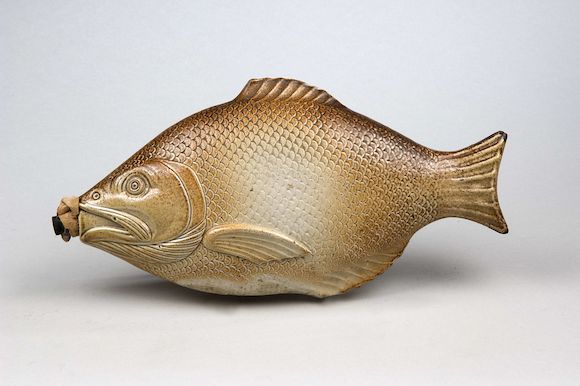 Bonhams : A stoneware fish shaped flask 19th Century,