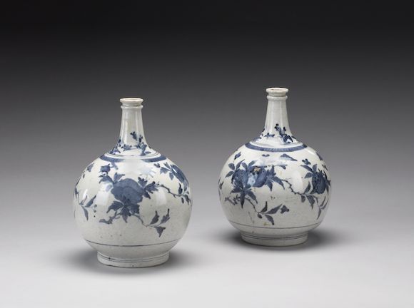 Bonhams : A pair of Arita blue and white bottle vases of gallipot-form: