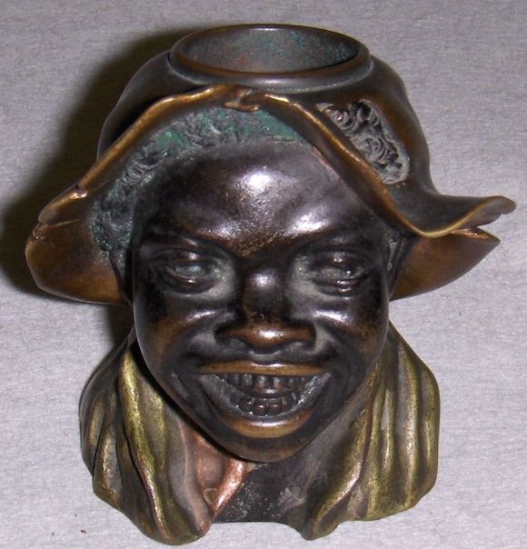 Bonhams : A cold painted bronze negro head tooth pick holder, probably ...
