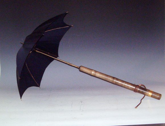 Bonhams : A Edwardian faux bamboo cased parosol